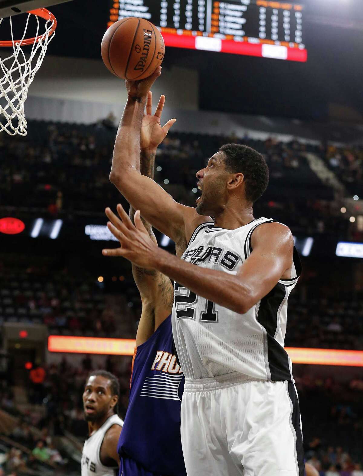 Duncan passes the torch to Aldridge on Sports Illustrated cover