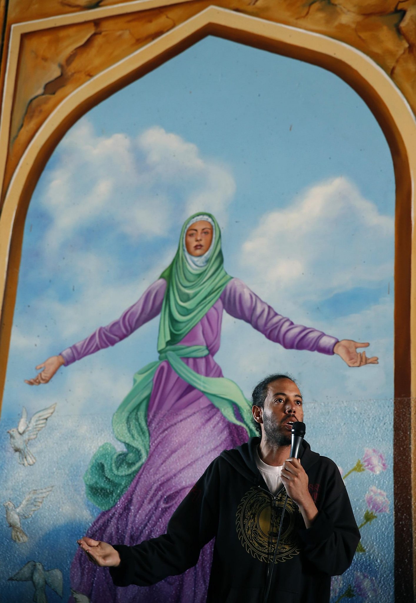 Somber dedication of Oakland mural at which artist was slain