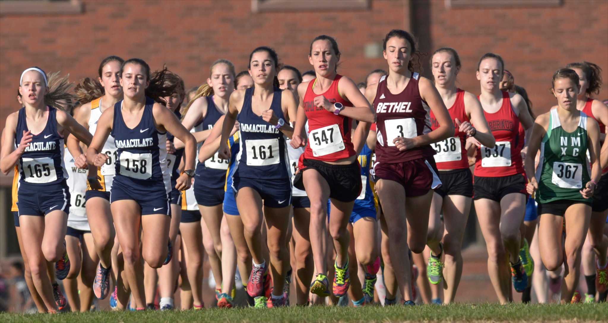 New Milford boys, Newtown girls bring home the conference crowns