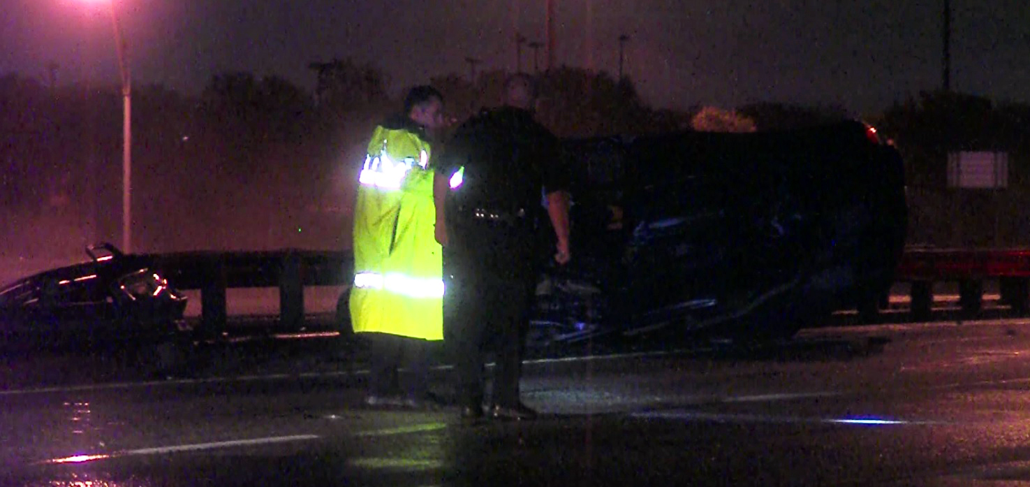 Rain causes driver to lose control, roll vehicle