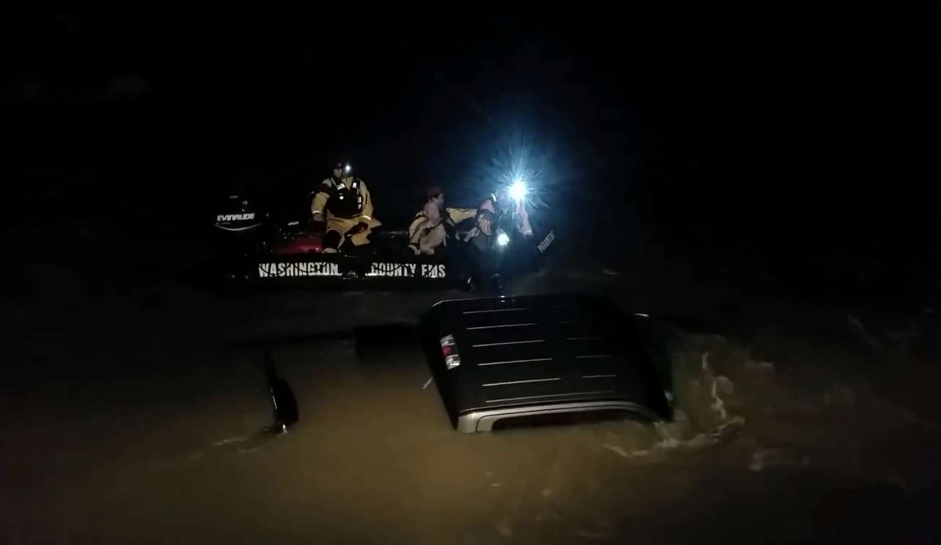 Raw video shows Texas rescue workers pulling dog, man from submerged ...