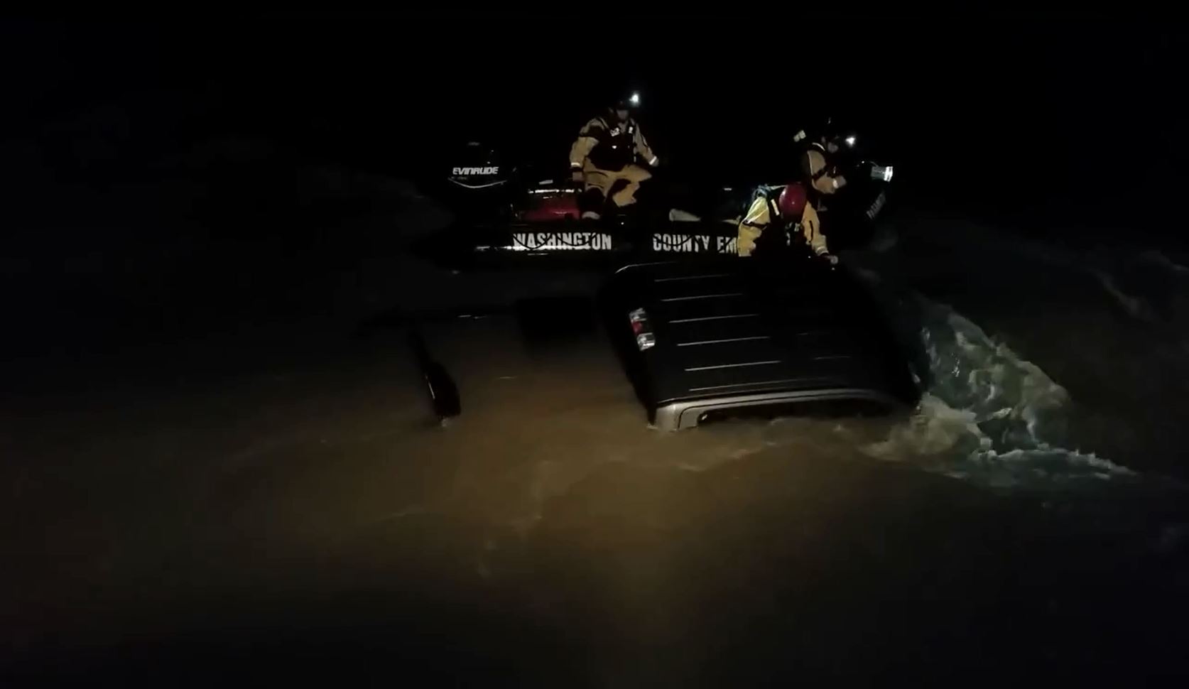 Raw video shows Texas rescue workers pulling dog, man from submerged ...