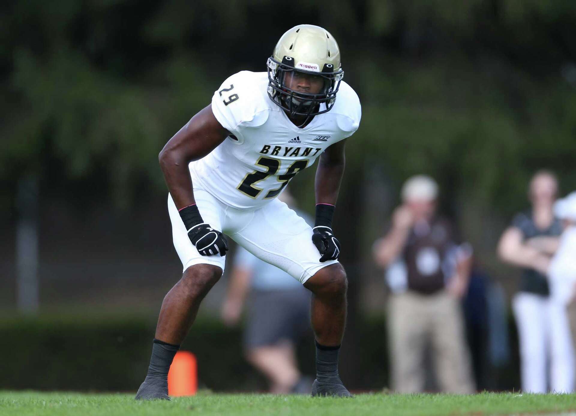 Former local football players post strong college games