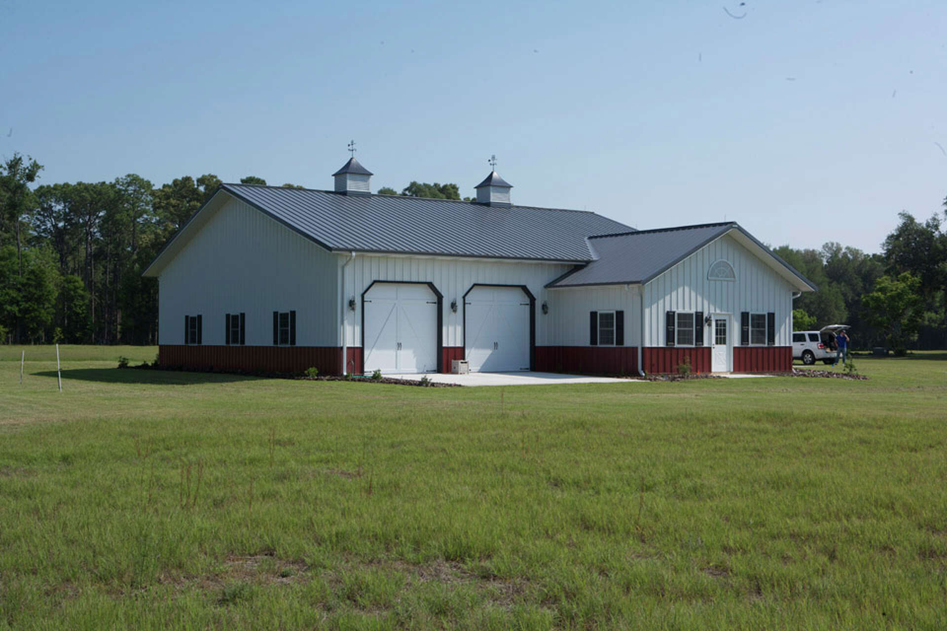 The bland-looking barns are anything but ordinary inside