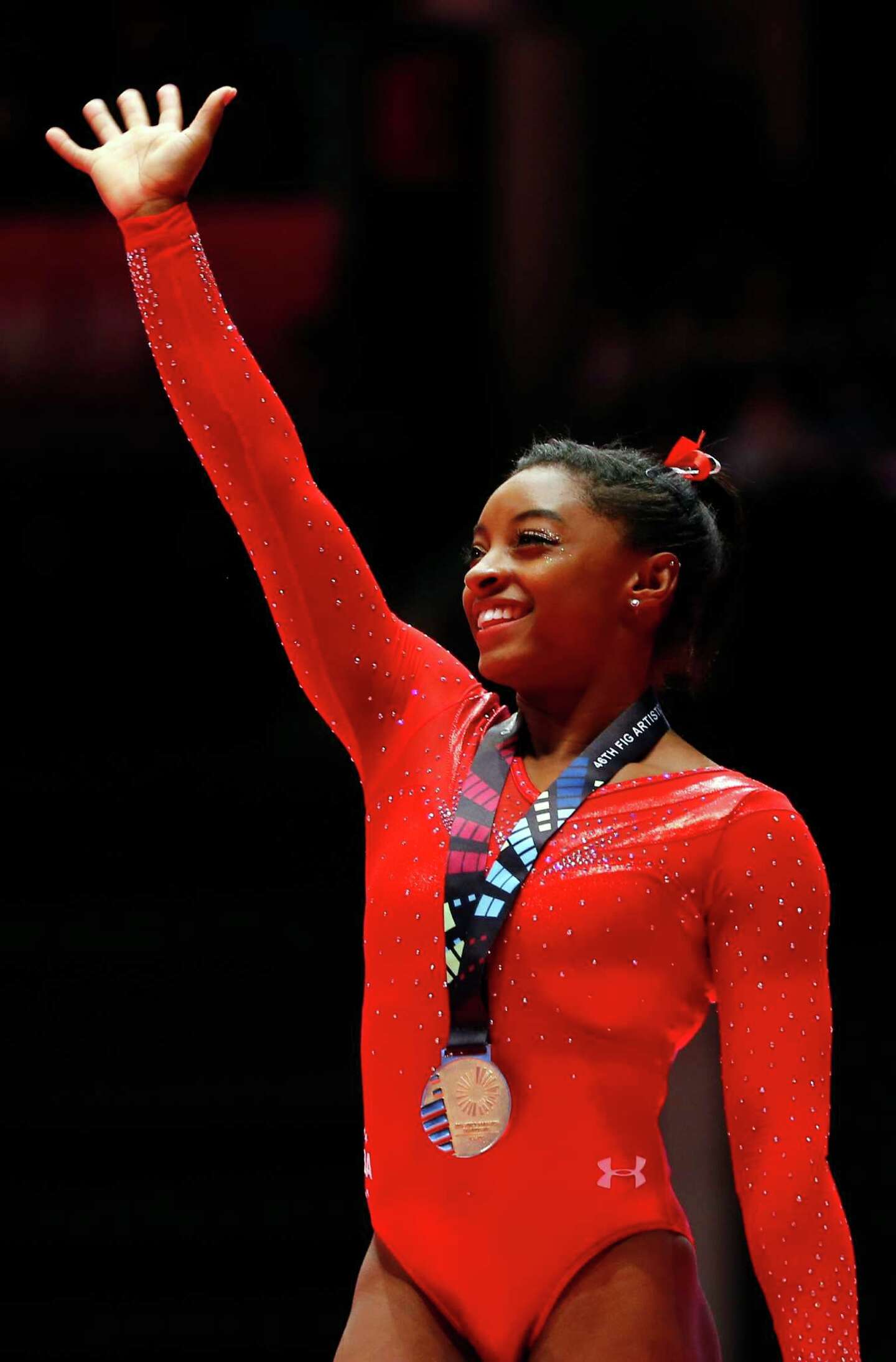 Spring's Simone Biles wins third straight world all-around gymnastics title