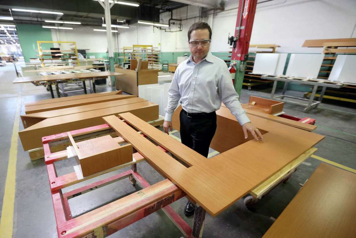 Woodworking company still solid after 80 years