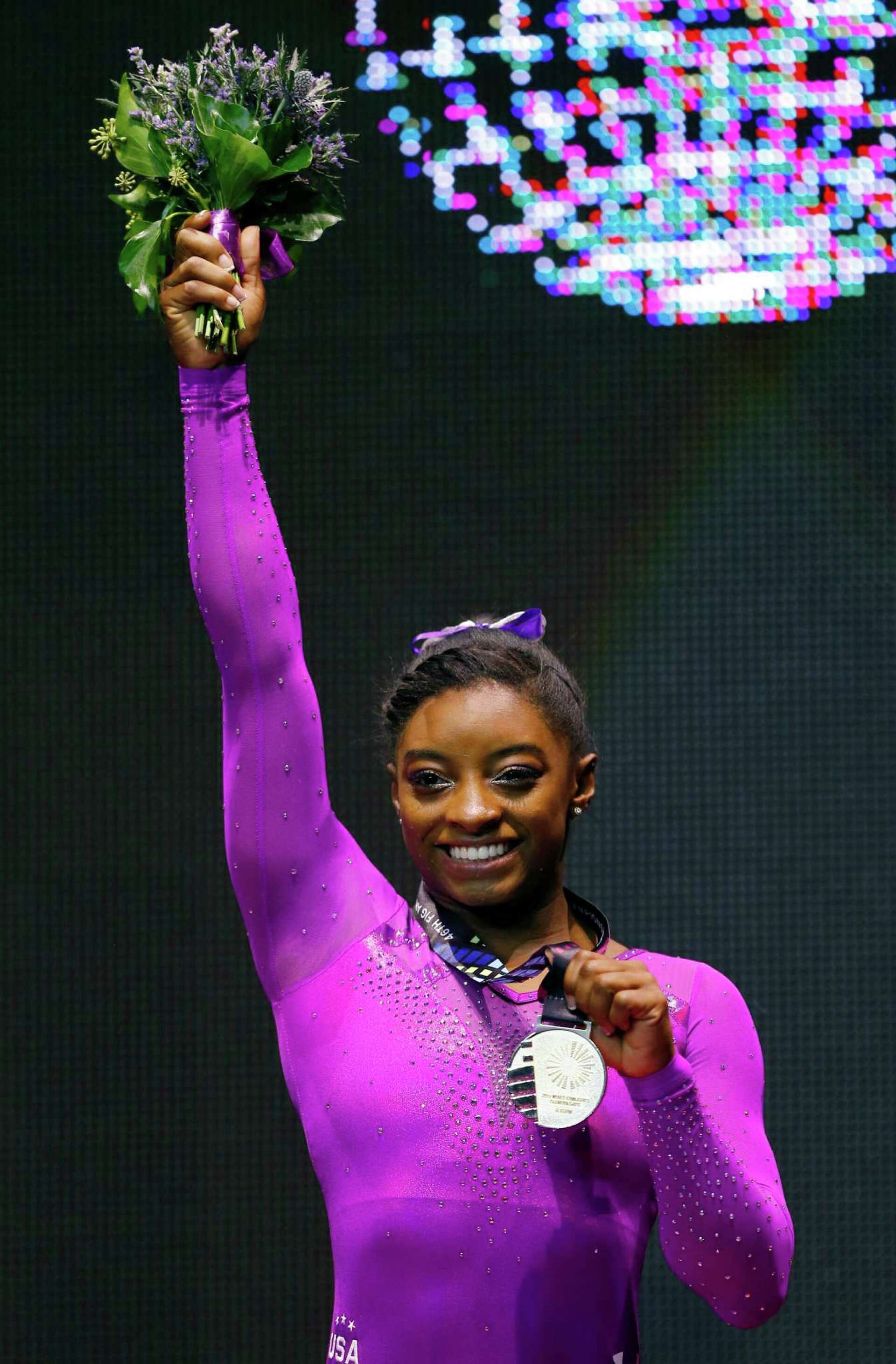 Spring's Simone Biles wins third straight world all-around gymnastics title