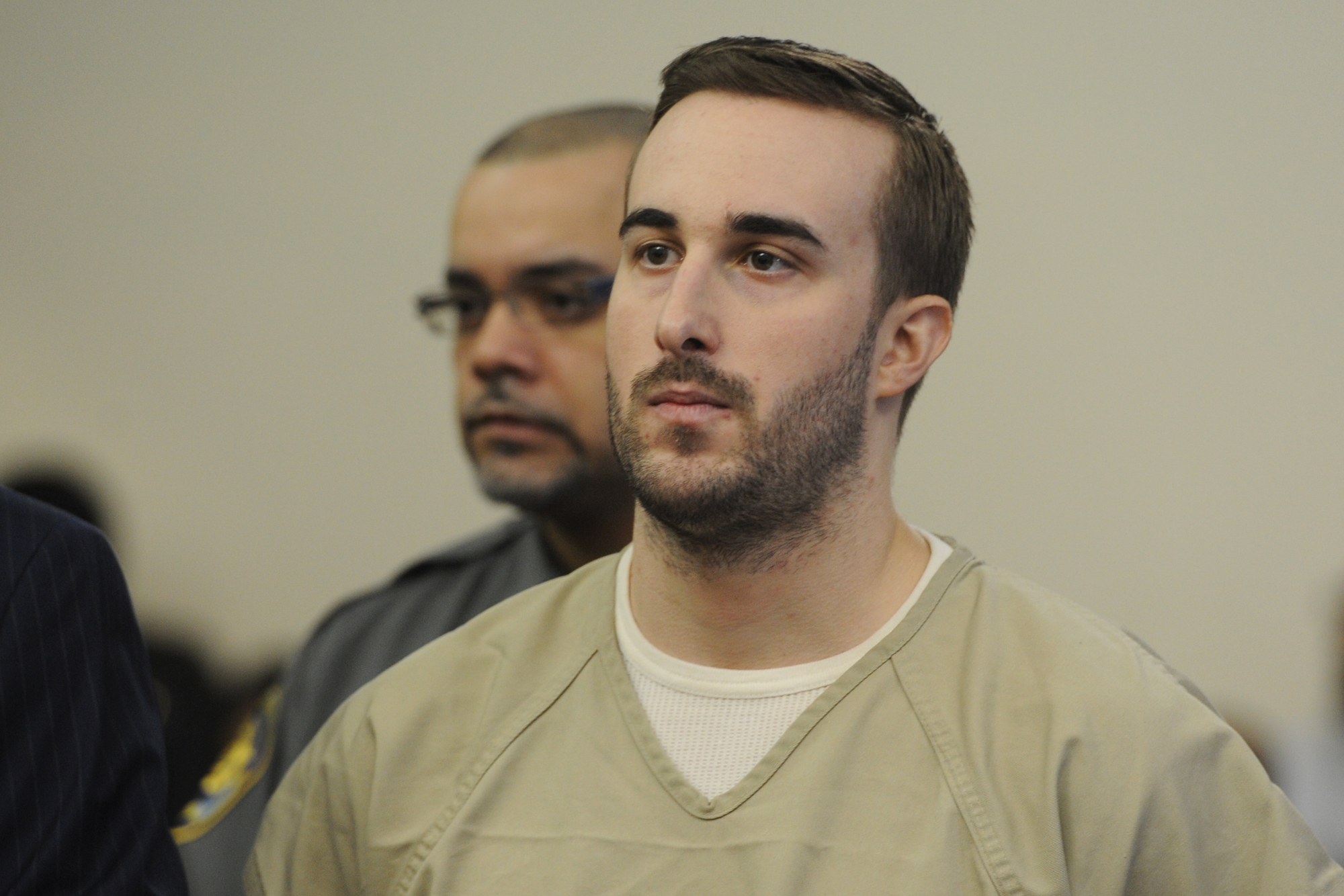 Navin impassive during murder arraignment