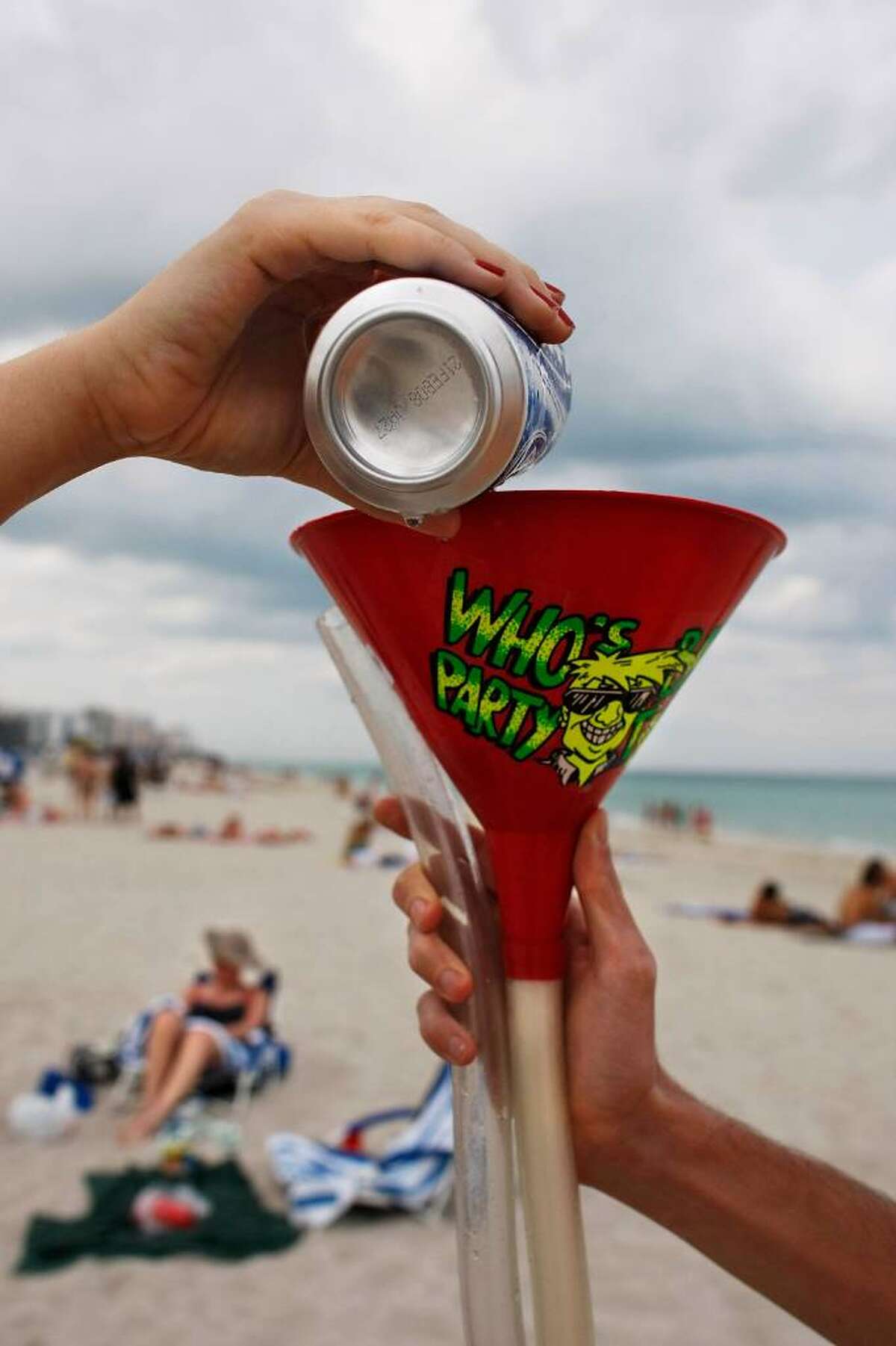 Slideshow: Spring breakers get rowdy on the beach and in the club