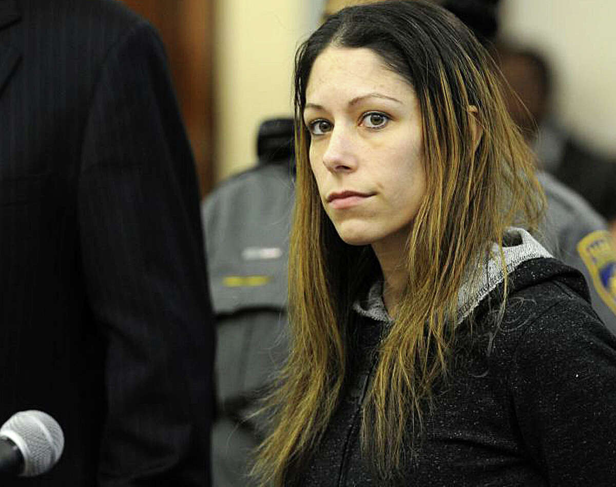 Son, girlfriend arraigned in murders of Westport trash business owners