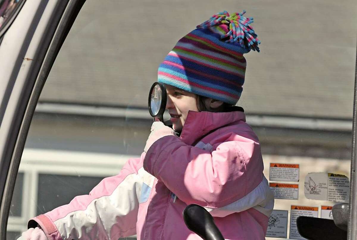 Children hop in driver's seat at Touch-A-Truck event