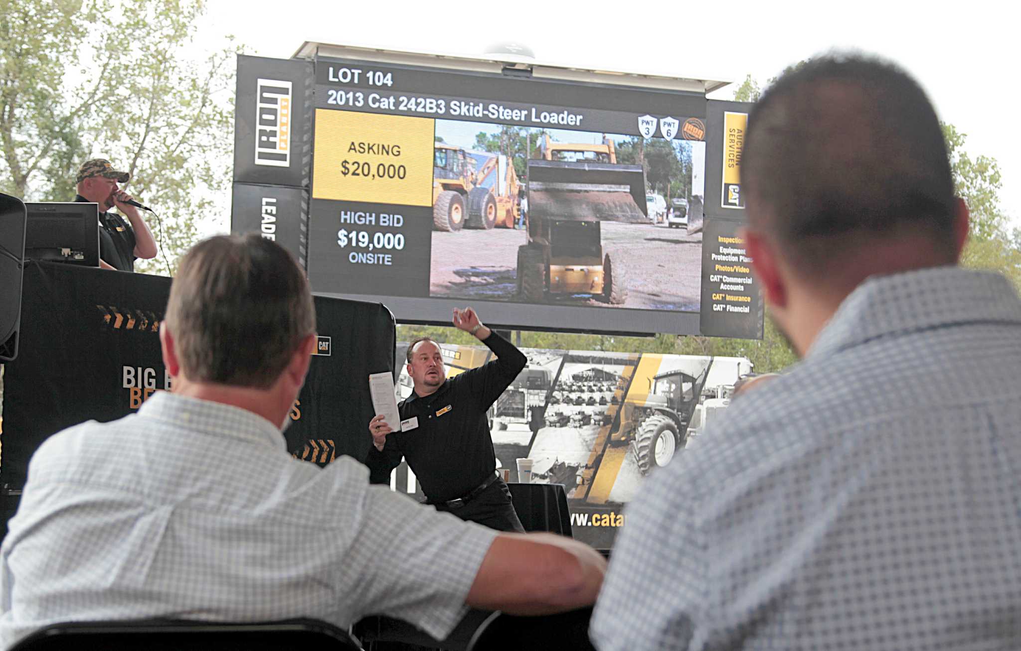 Auction draws bidders in person and online