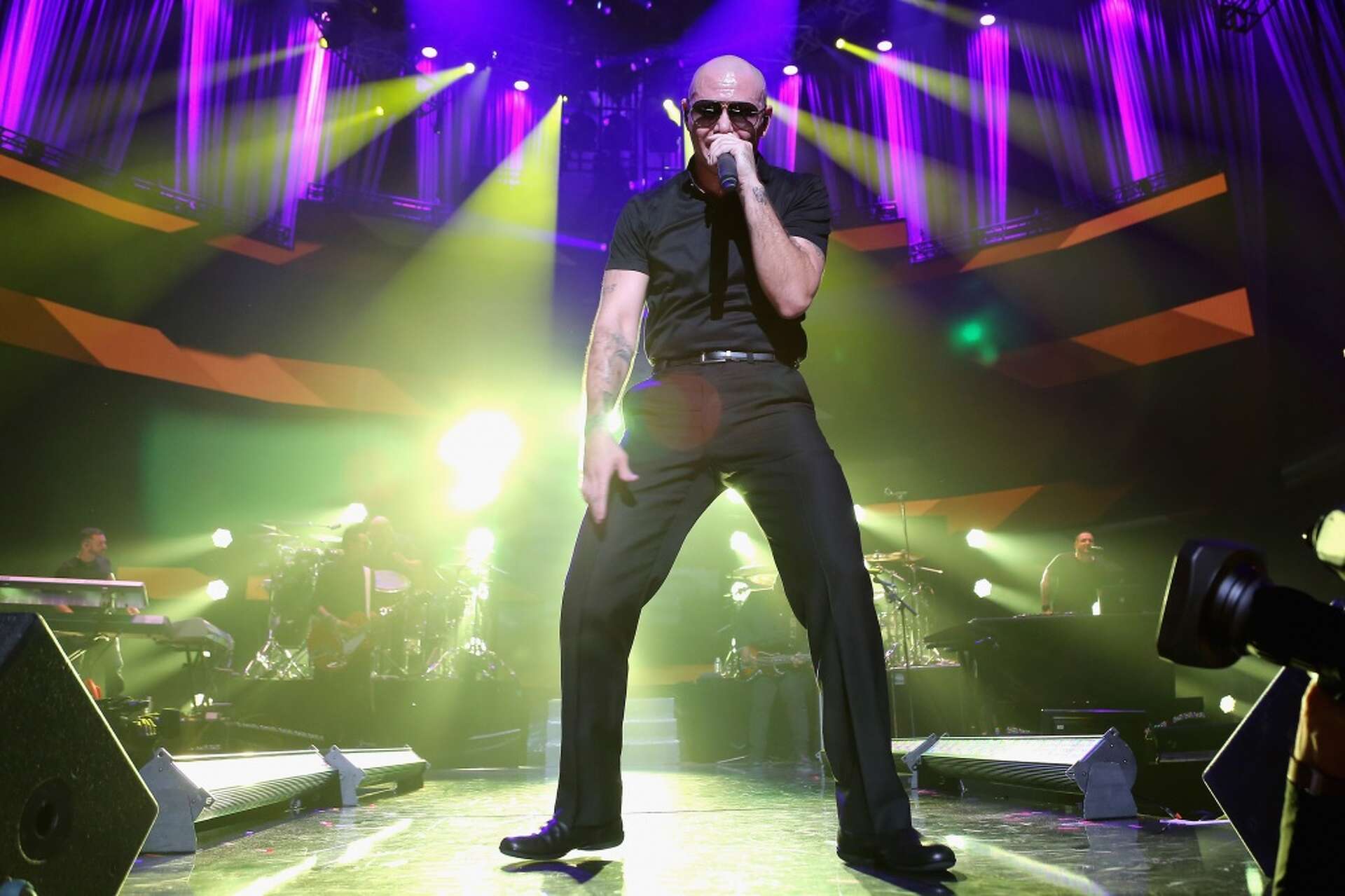 Local billionaire surprises employees with Pitbull performance