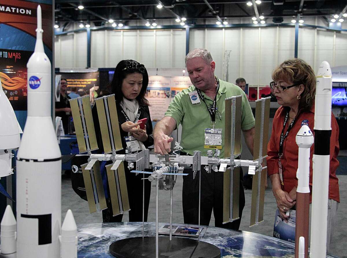 SpaceCom exhibits put can-do spirit on display