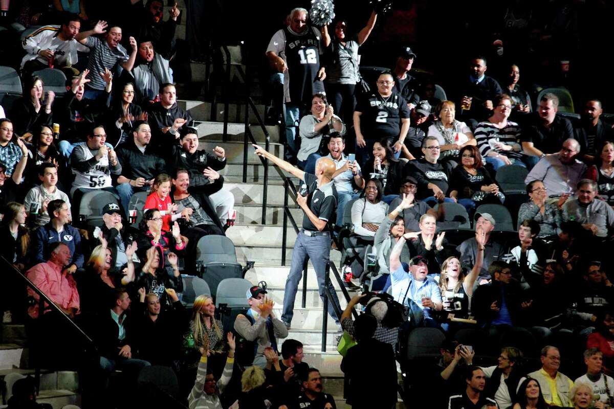 San Antonio Spurs fans cheer on team as they beat Denver