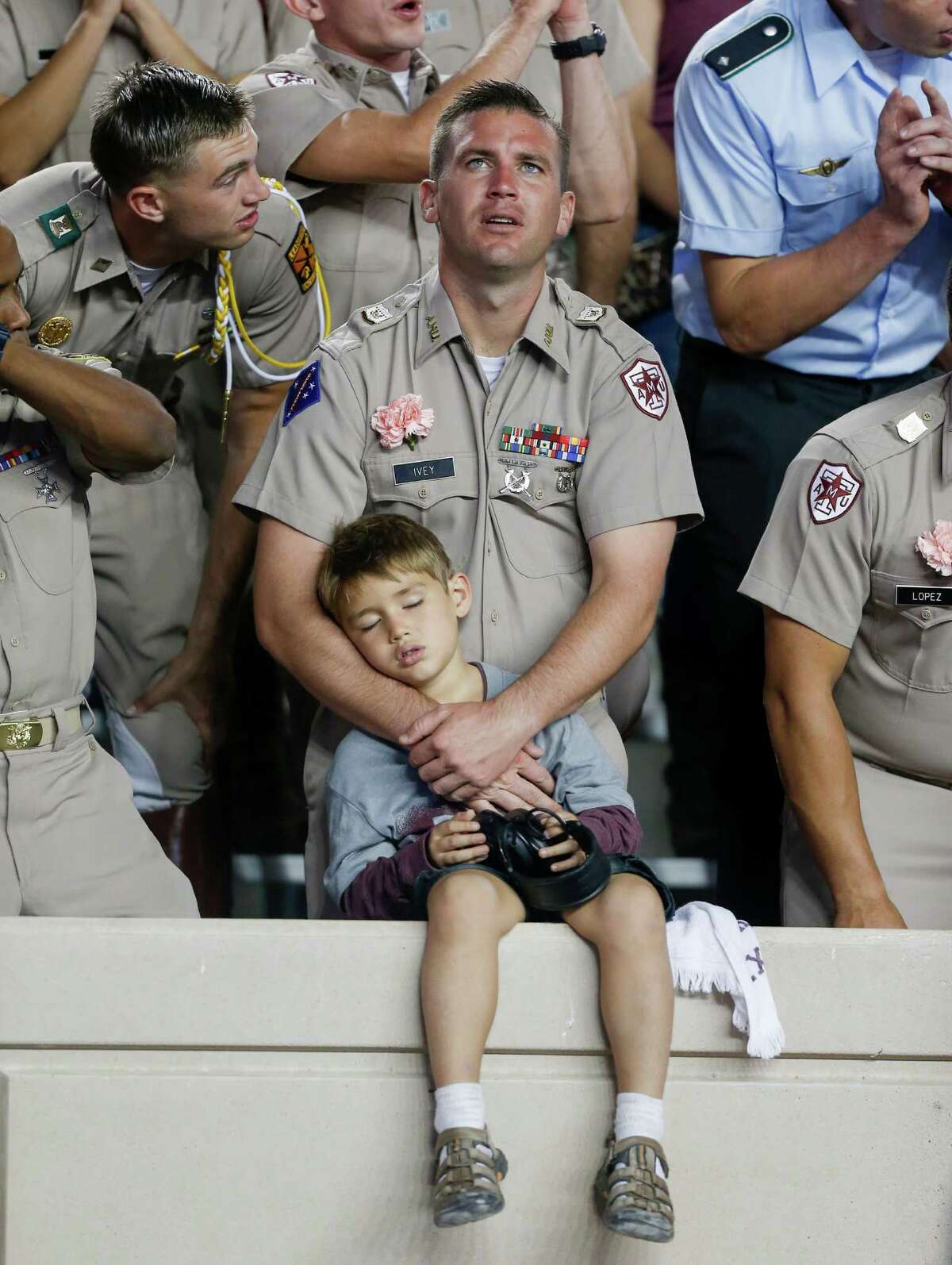 Aggies unite to welcome Marine, 6-year-old son to Aggieland