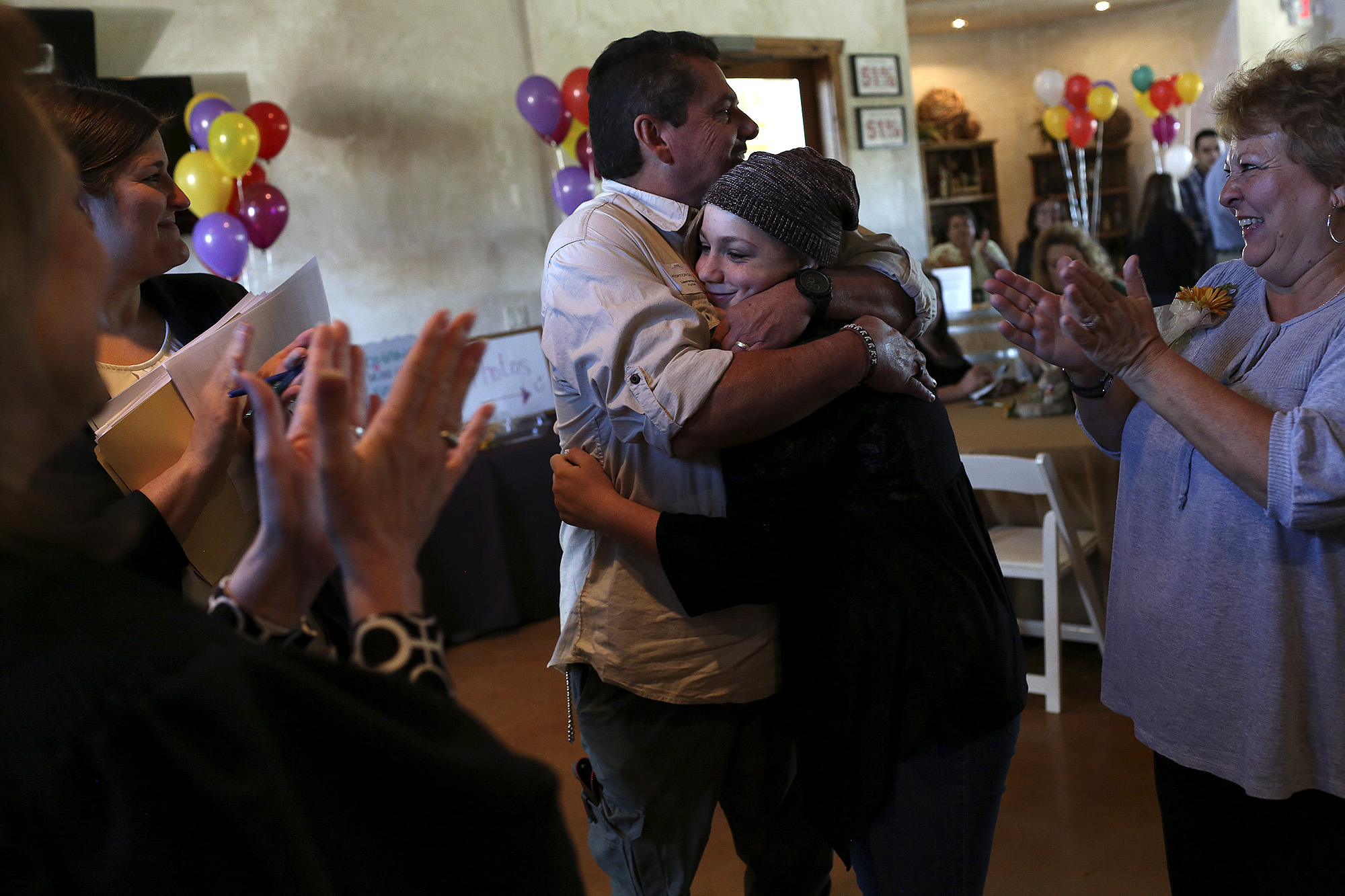 Legally together now, families celebrate adoption