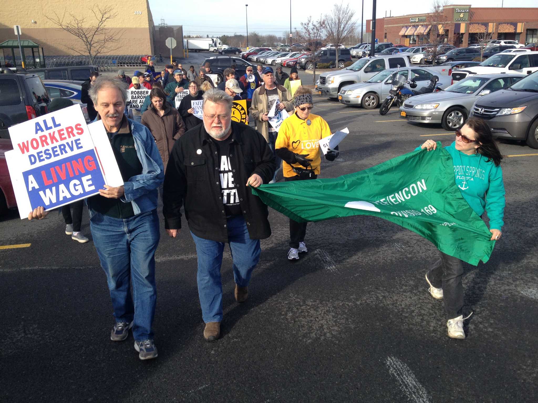Dozens protest Walmart worker's firing as company changes story again