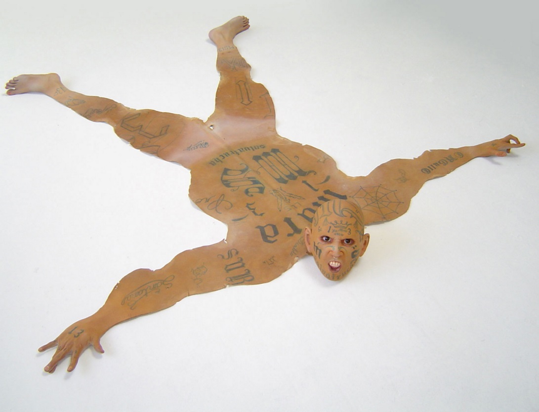 Artist creates rugs depicting MS-13, MS-18 gang members