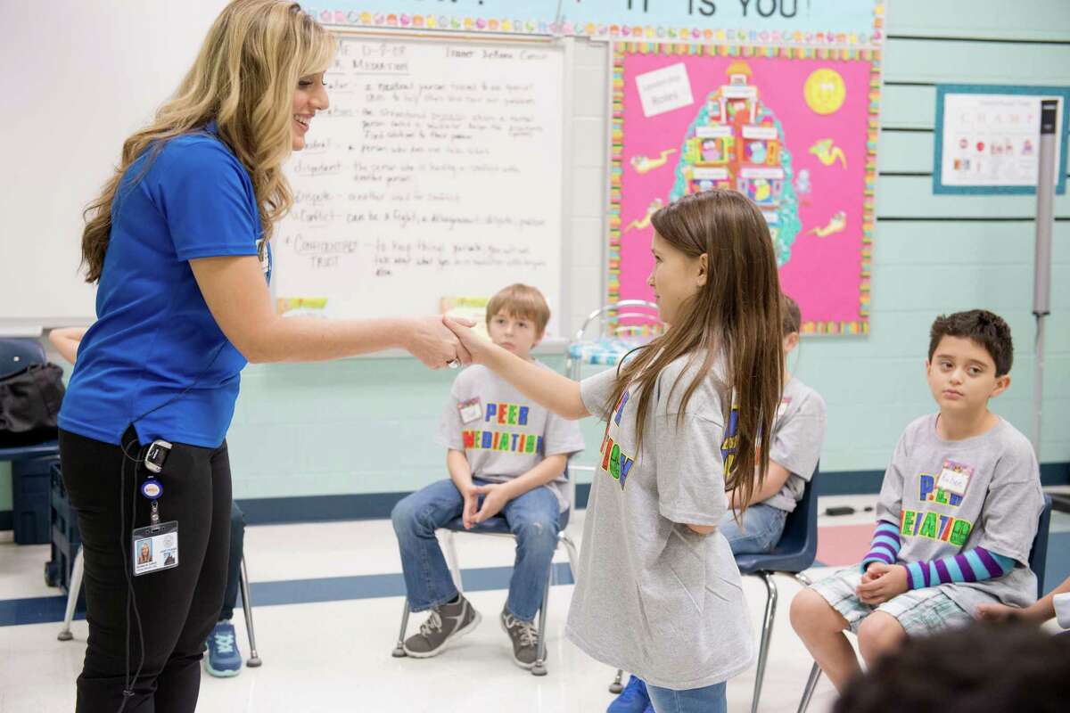 Young students learn how to resolve conflicts without violence
