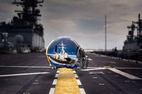 Check out these sweet new Navy football helmets