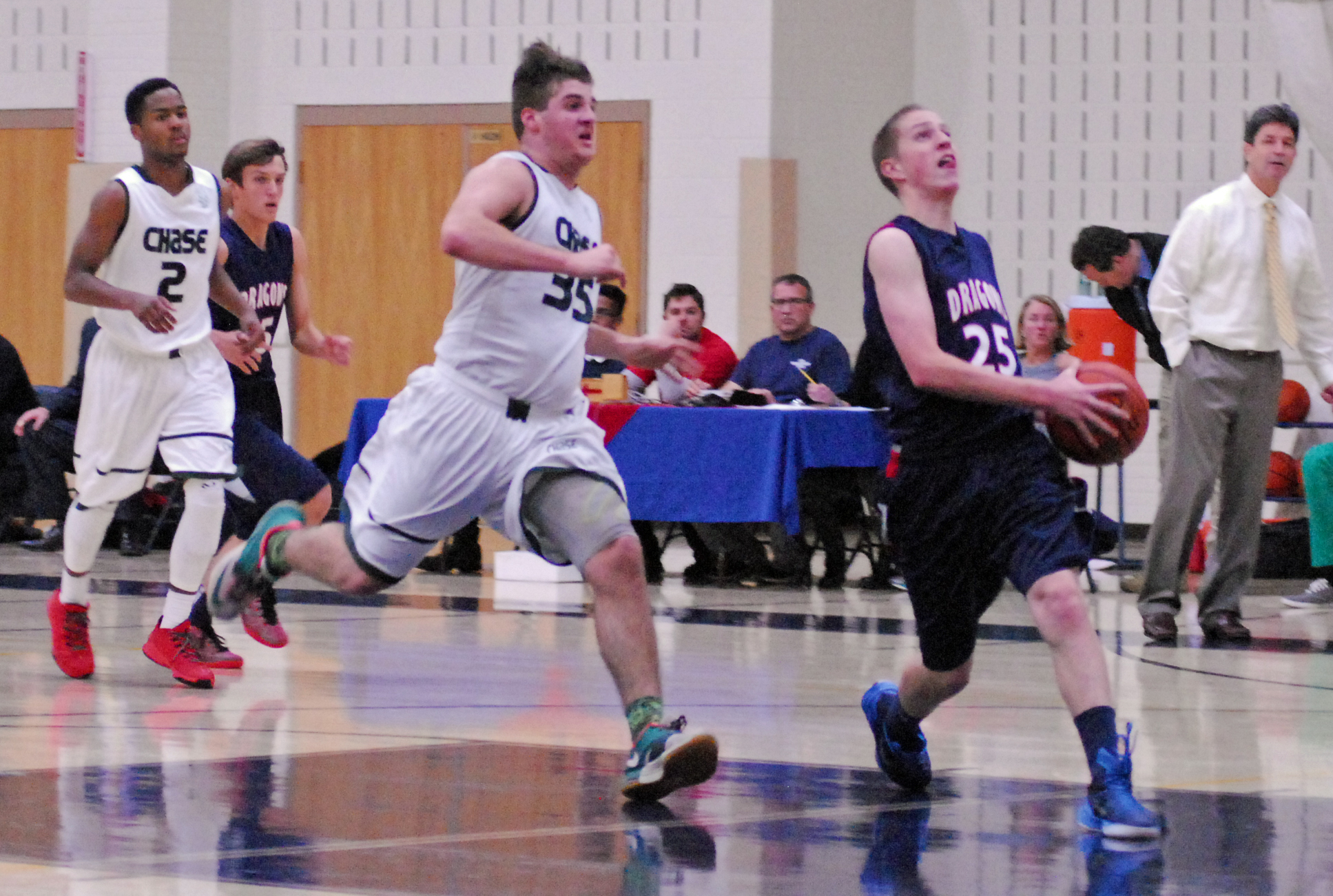 GFA boys basketball wins season opener