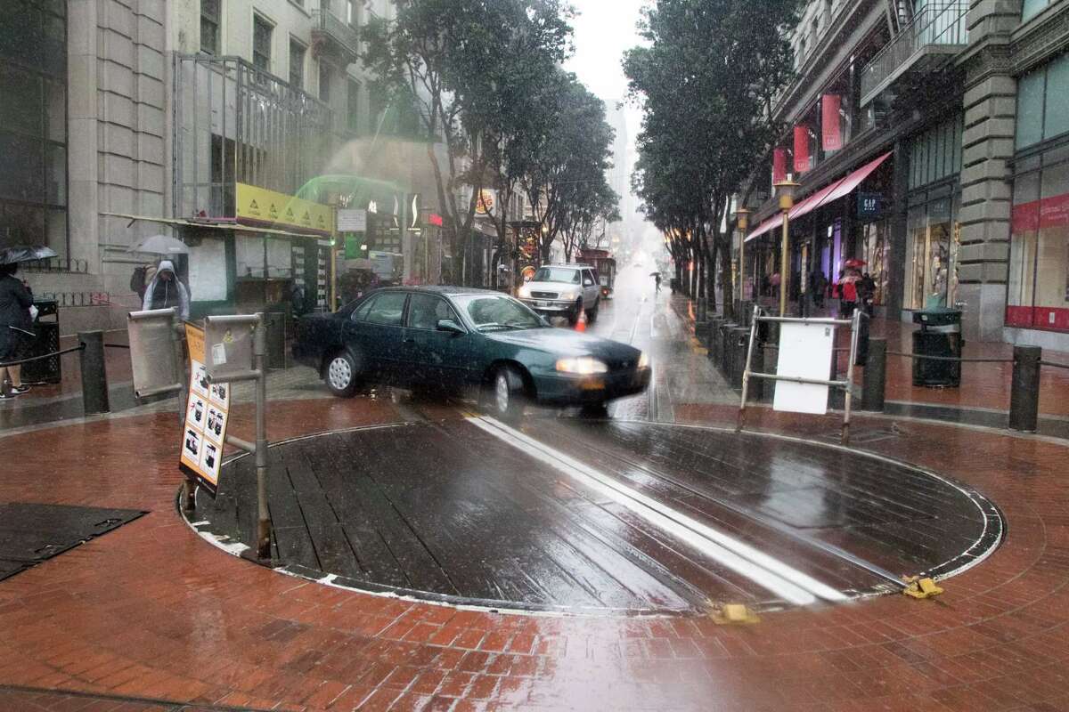 Car drives onto Powell St. cable car turnaround in S.F.