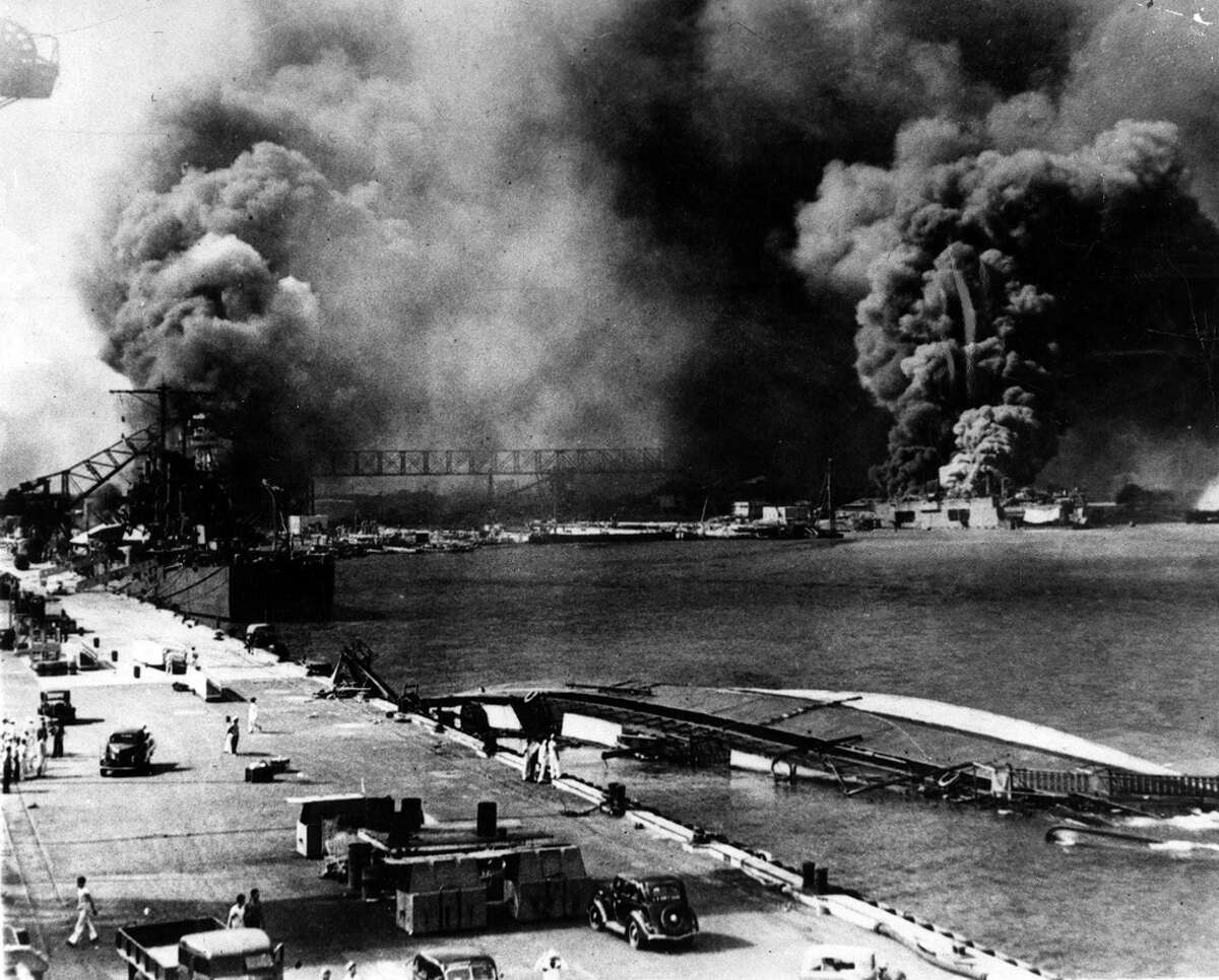 Unforgettable photos captured the attack on Pearl Harbor 76 years ago today