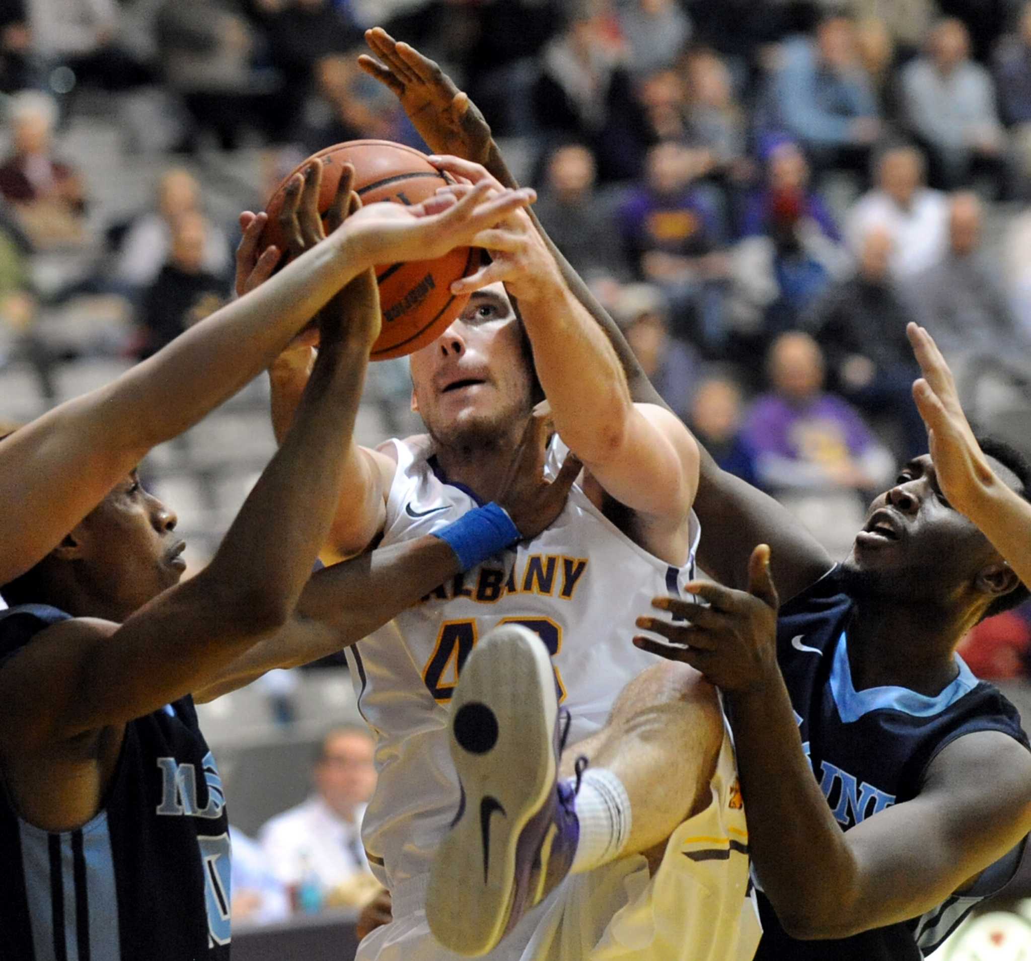 CBA grad Greig Stire grows into role for UAlbany basketball
