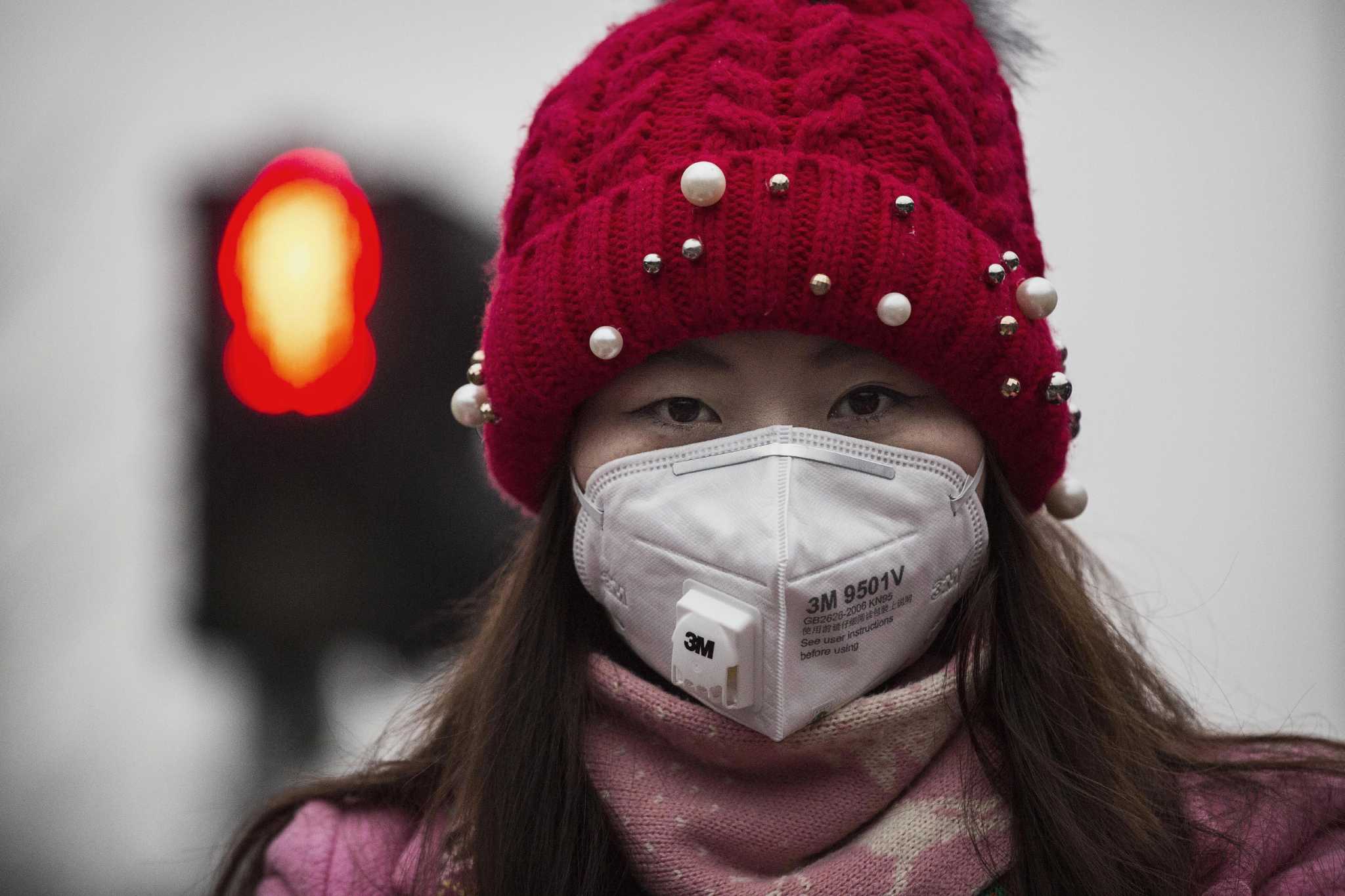 Smog masks as normal as winter hats in Beijing