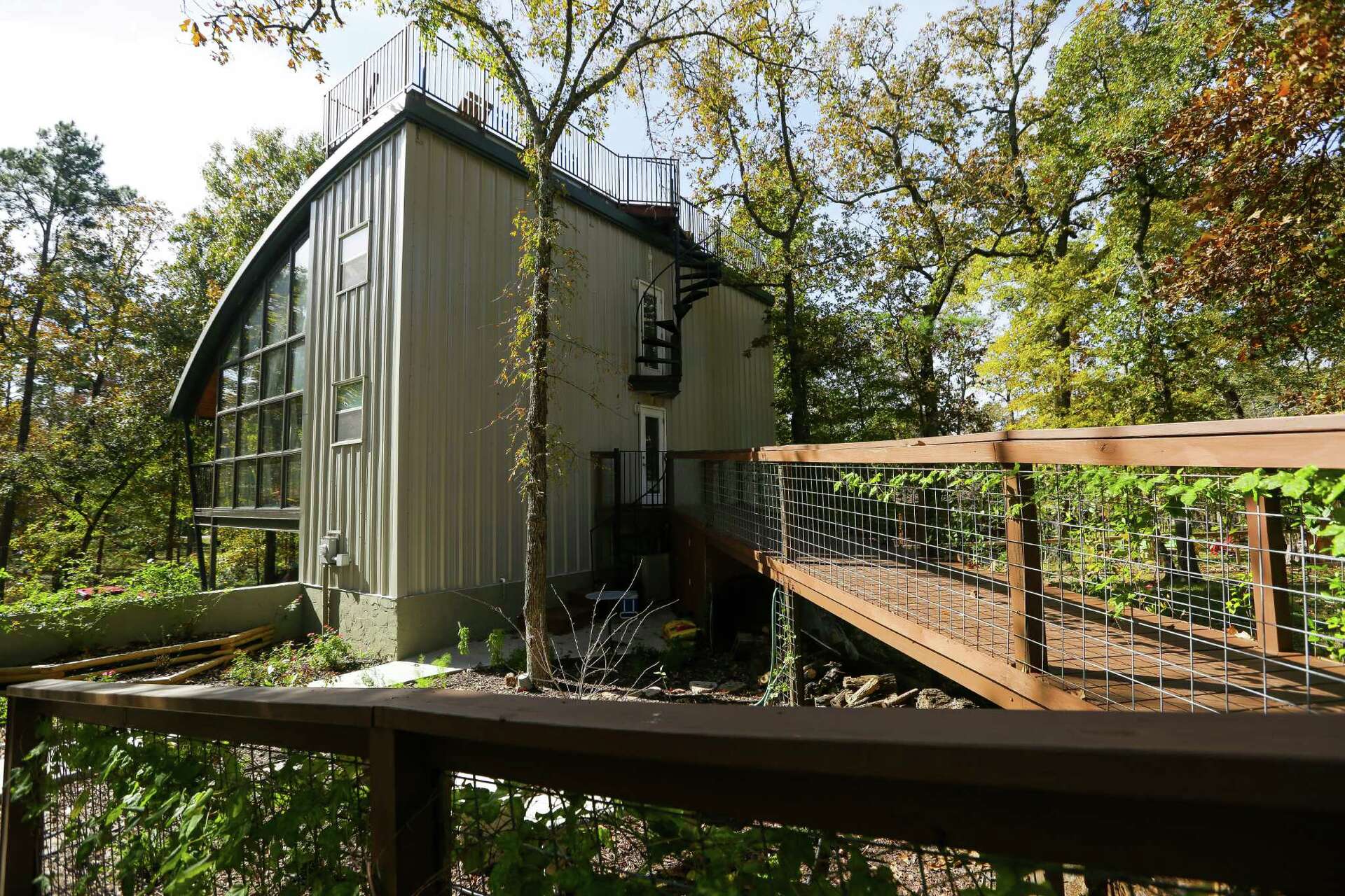 Couple builds a second home up among the treetops