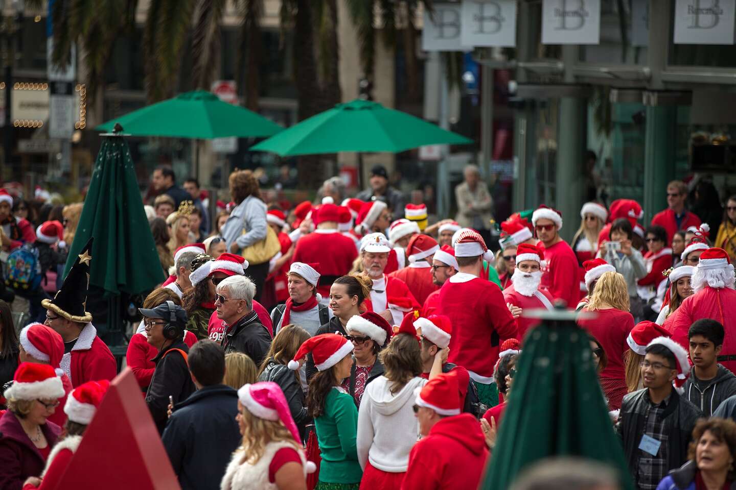 Santas and friends fill downtown for annual holiday bar hop