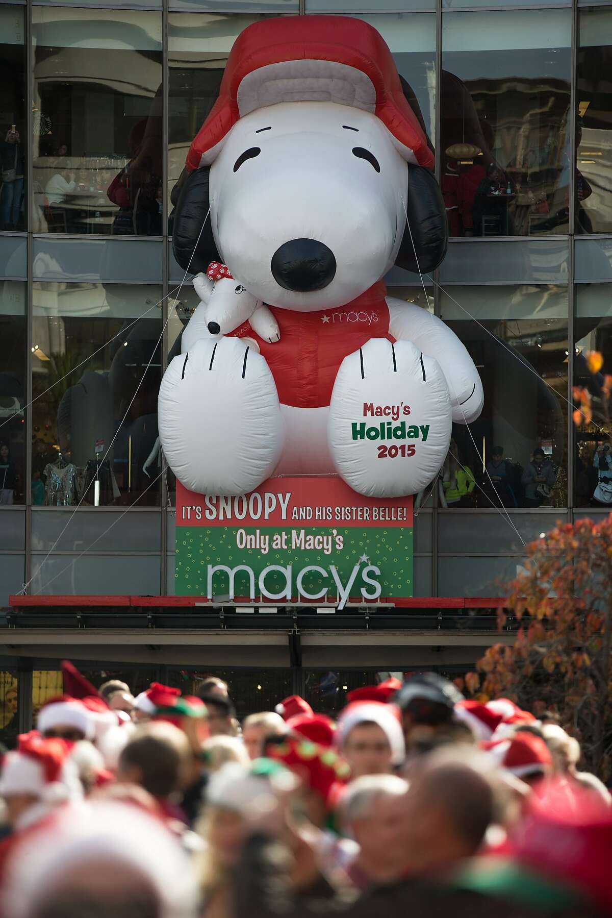 Santas and friends fill downtown for annual holiday bar hop