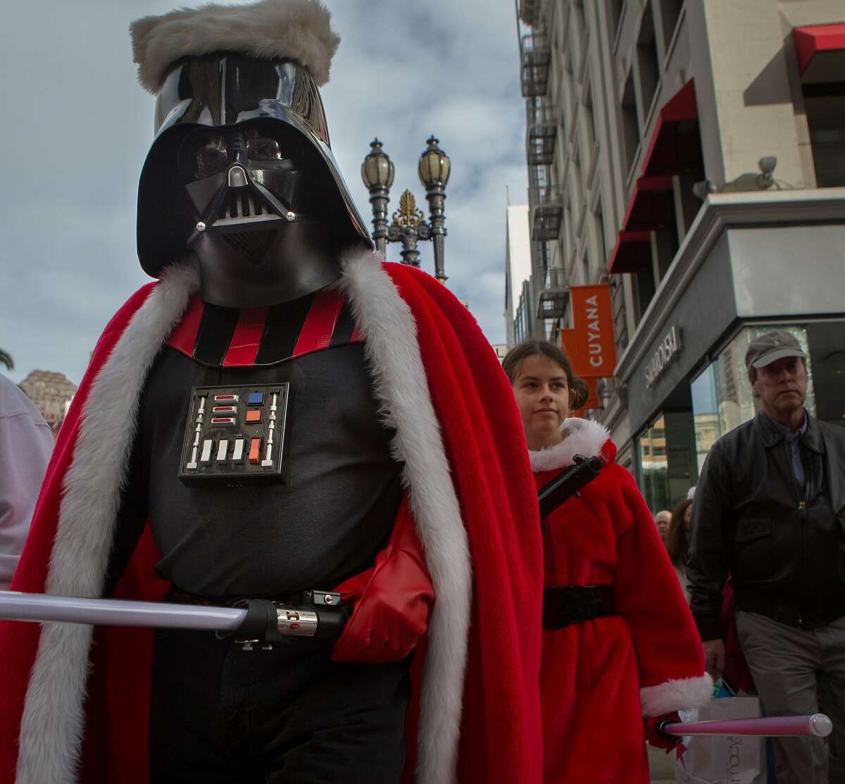 Santas and friends fill downtown for annual holiday bar hop