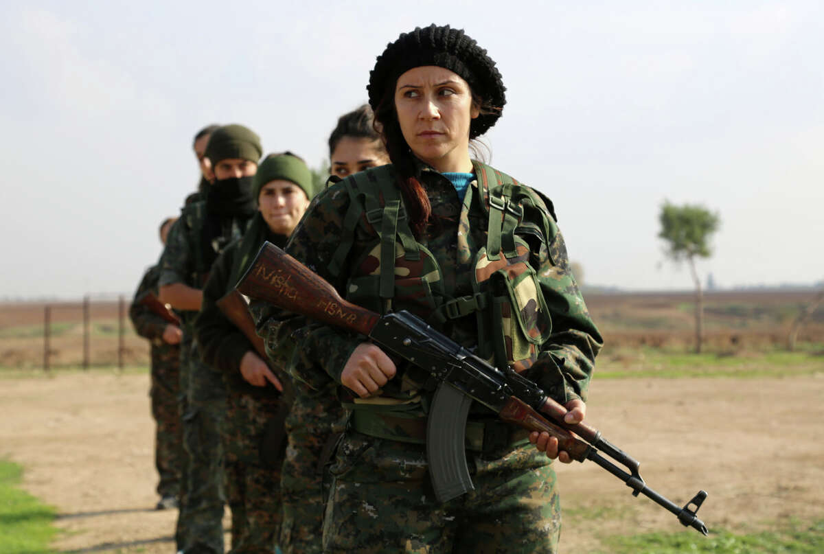Christian female soldiers of Female Protection Forces battle ISIS on ...