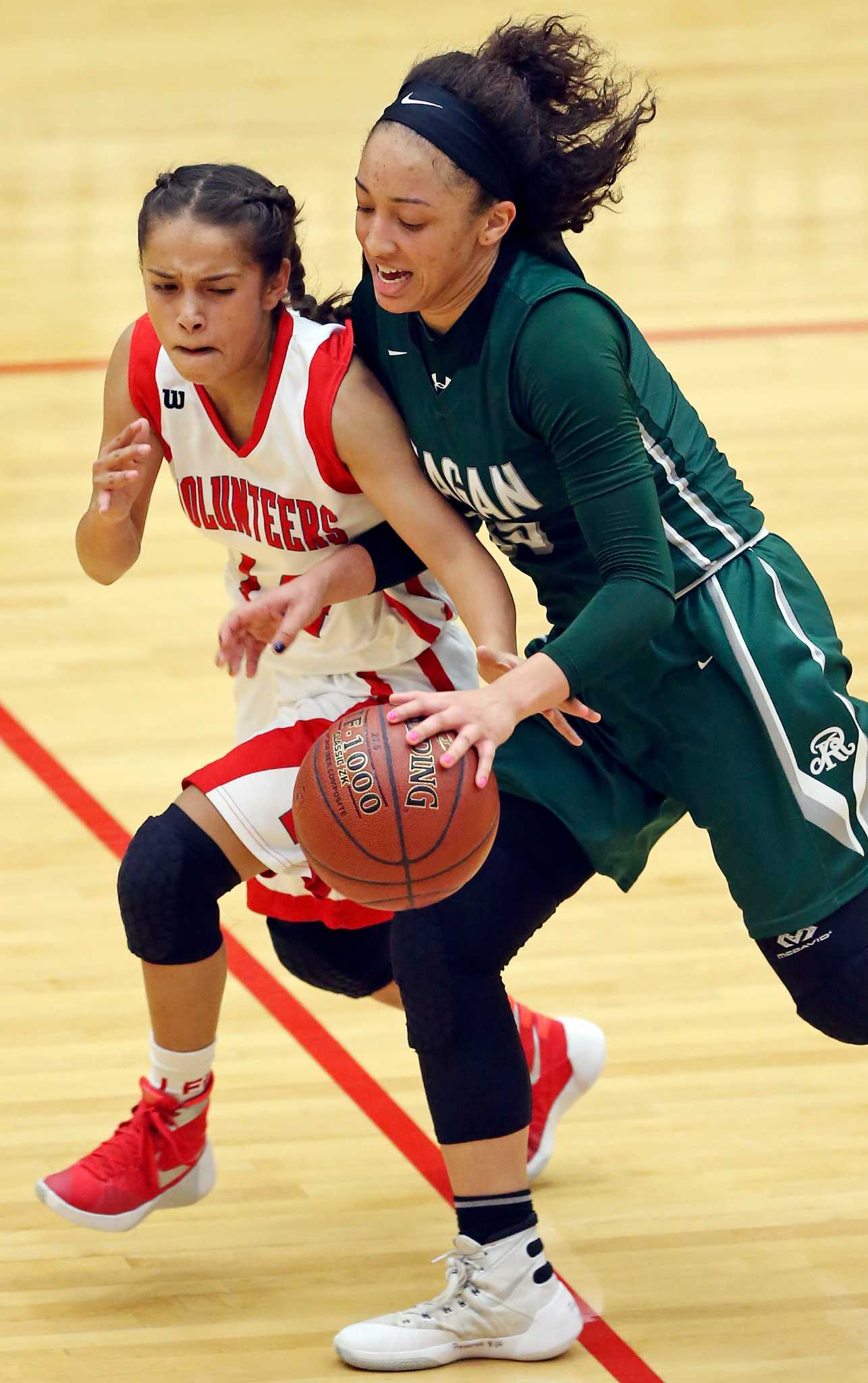 Lewis’ triple-double carries Reagan over Lee