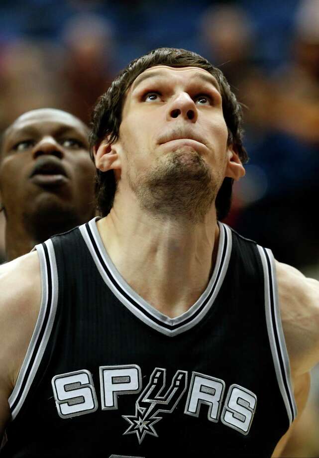 Boban Marjanovic's hands look impossibly huge - San Antonio Express-News