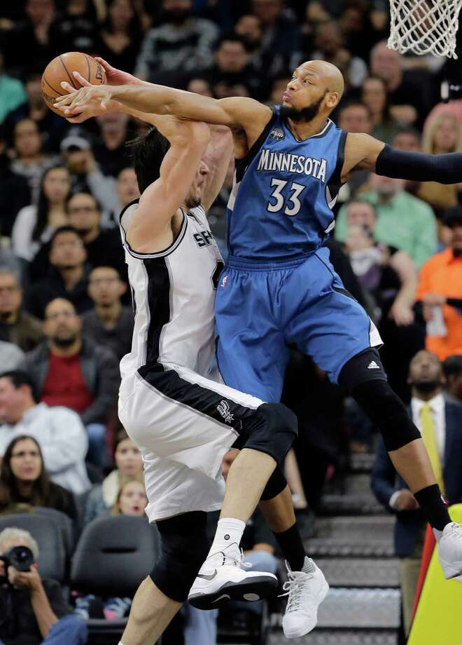 Boban Marjanovic's hands look impossibly huge - San Antonio Express-News