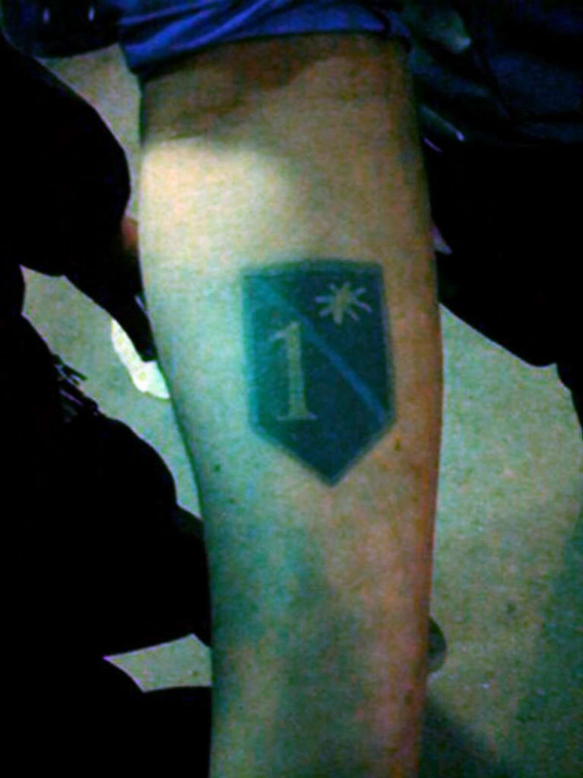 State judicial officials unveil order to cover up tattoos
