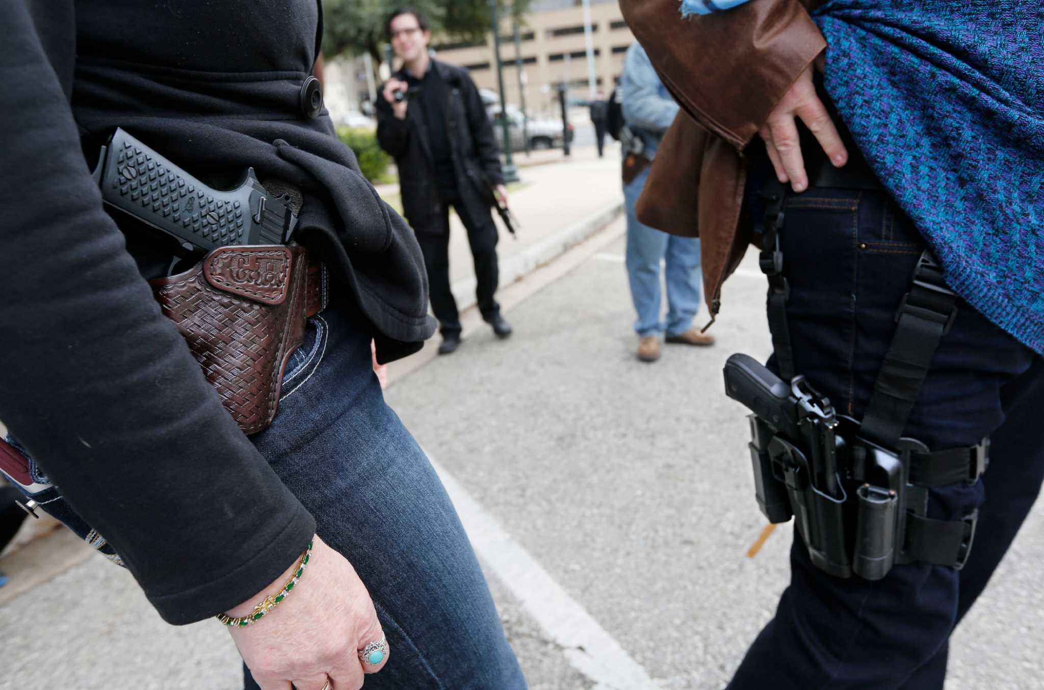 Armed Texans celebrate state's open carry status