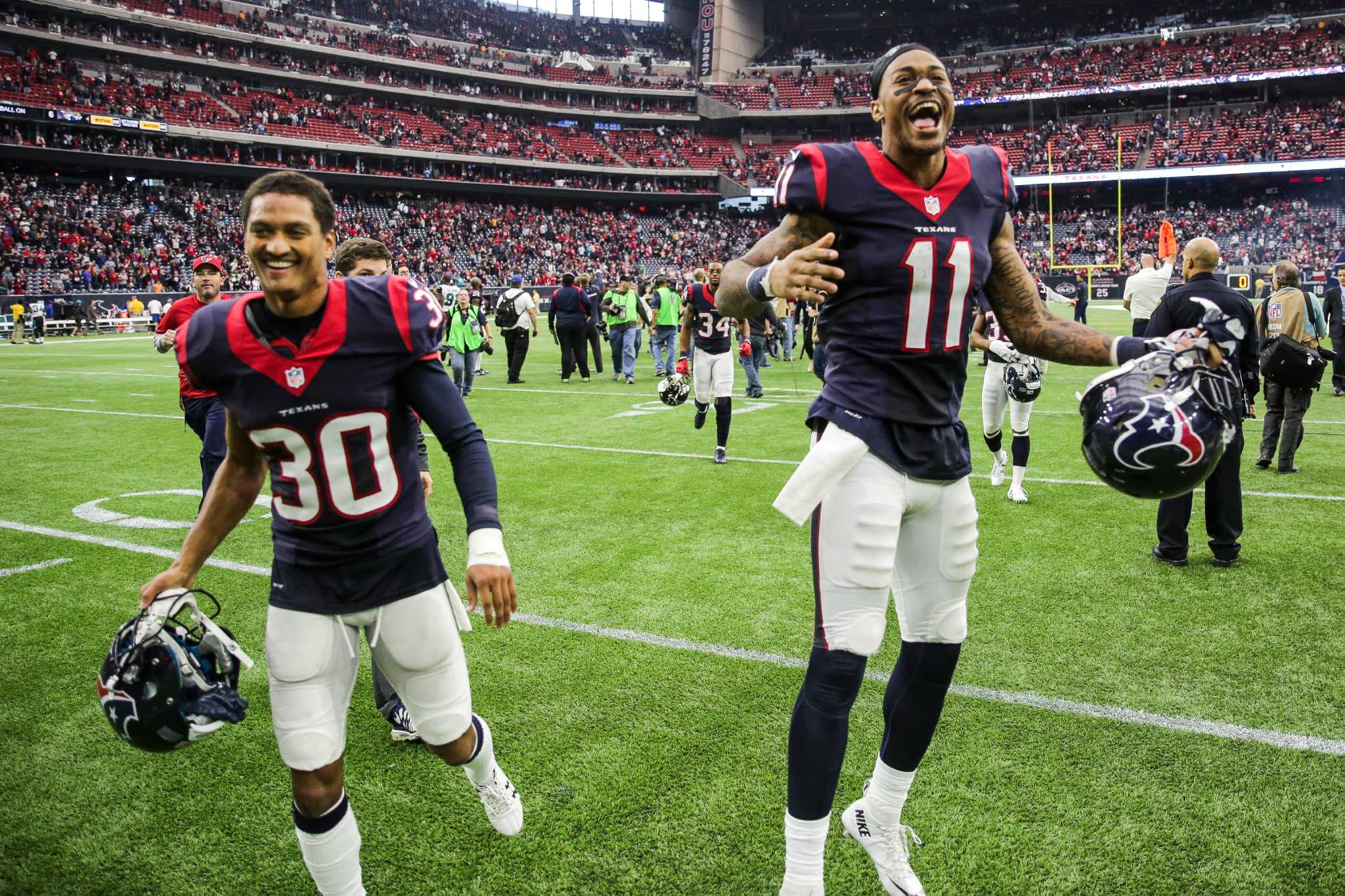 Texans mute celebration with bigger goals in mind