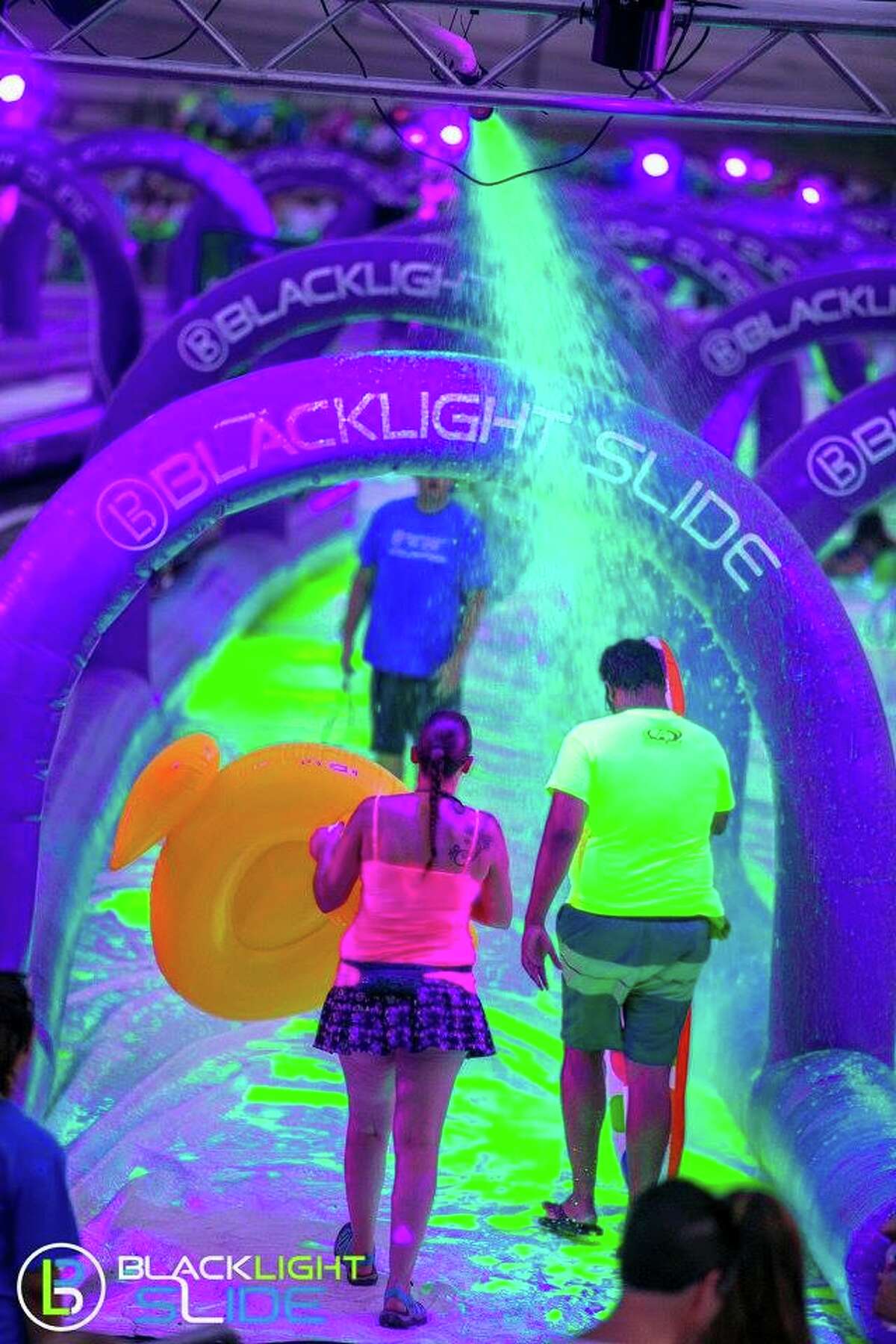 Blacklight slide party, a water-themed rave for all ages, is coming to ...