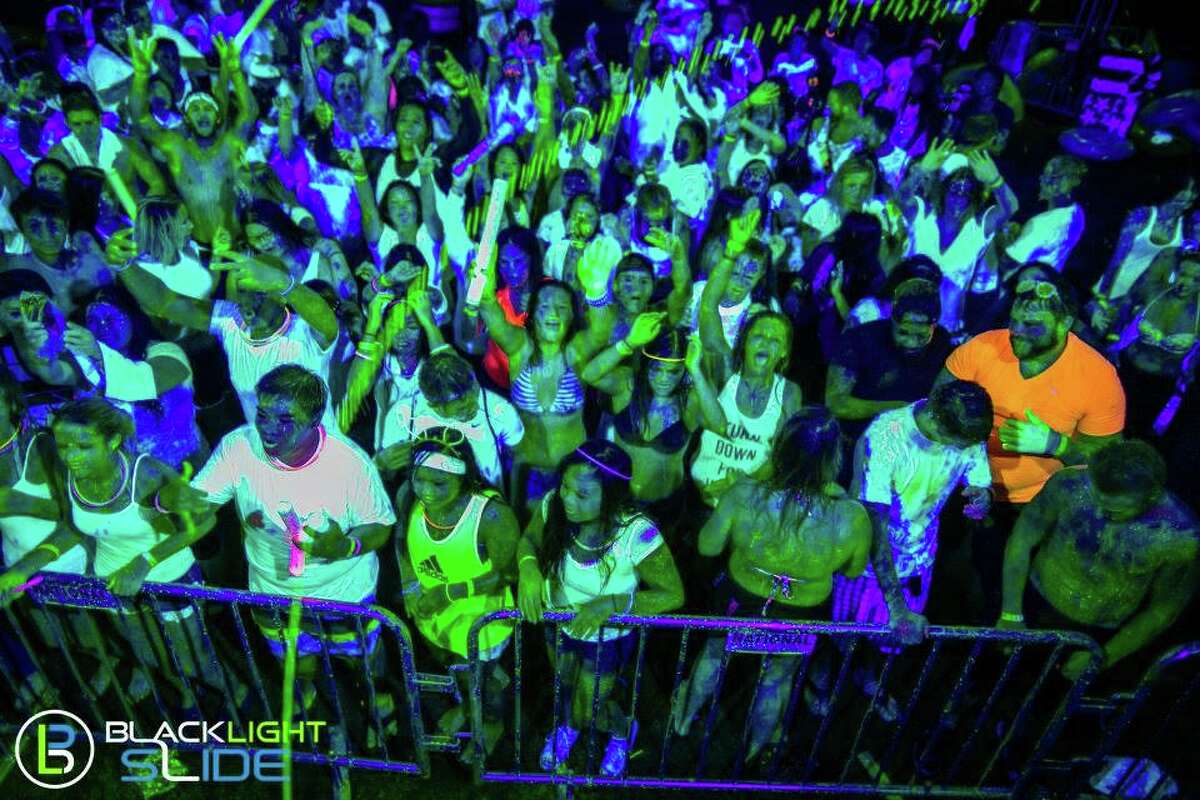 Blacklight slide party, a water-themed rave for all ages, is coming to ...