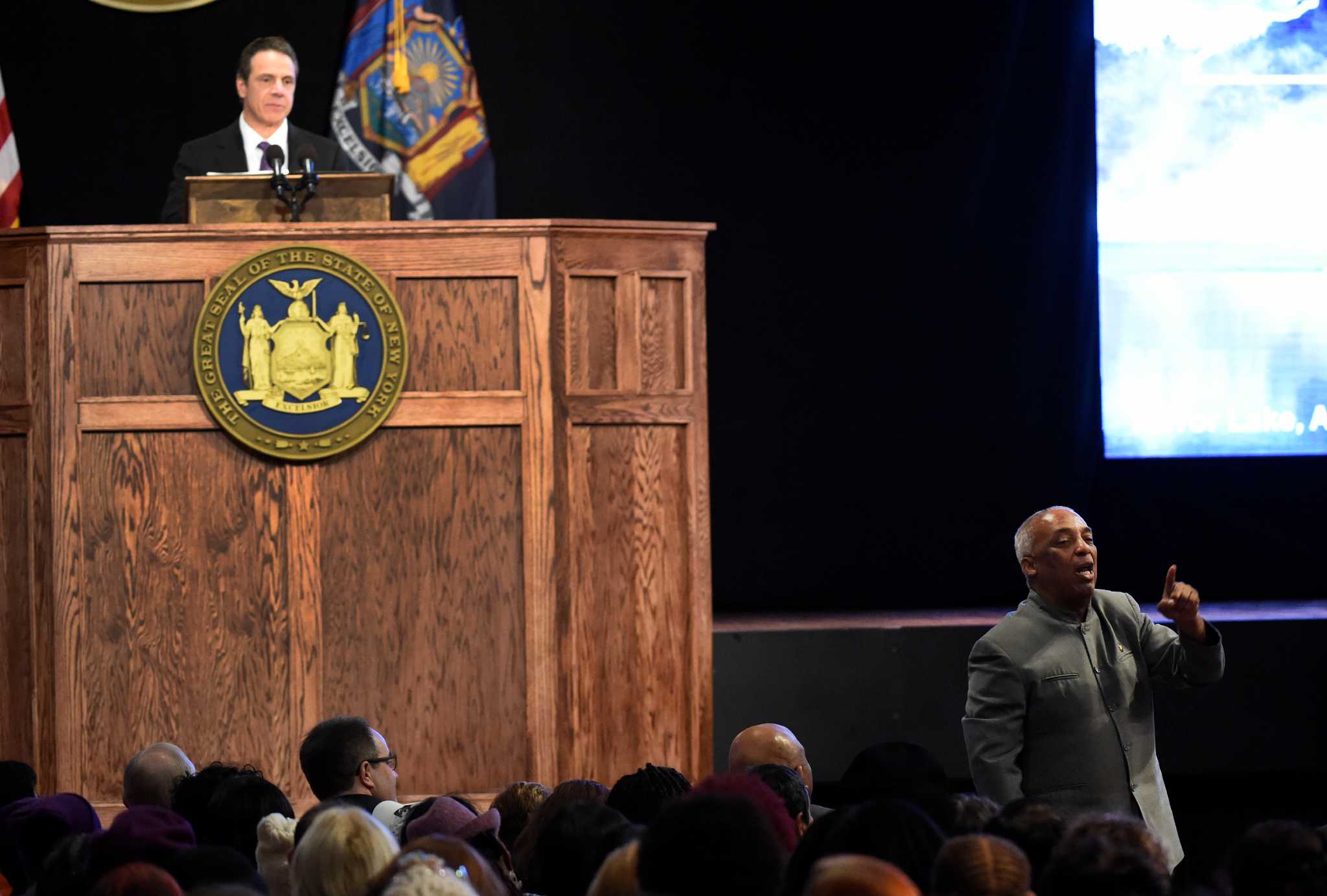 Big speech, huge podium for Cuomo