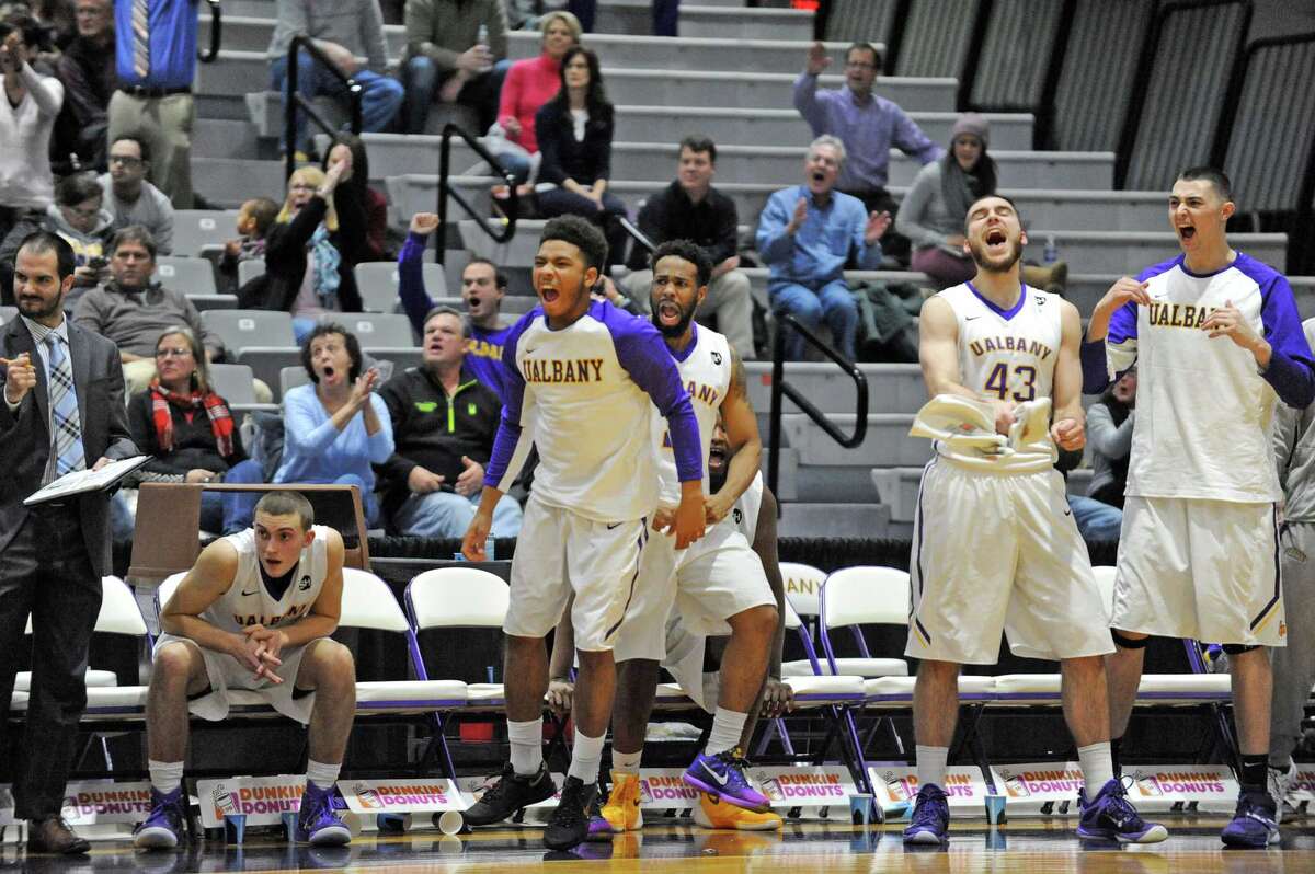 For college basketball's benchwarmers, hard work and little fanfare