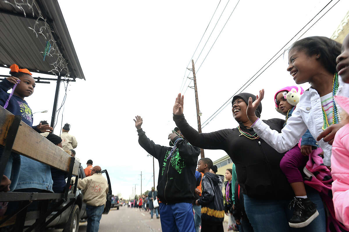 Families use MLK parade to teach children about history