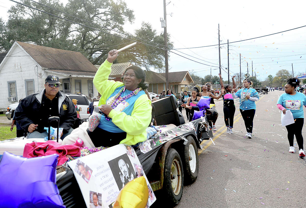 Families use MLK parade to teach children about history