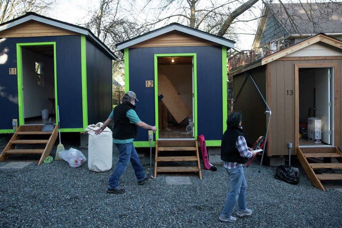 Tiny house village opens for homeless in Seattle
