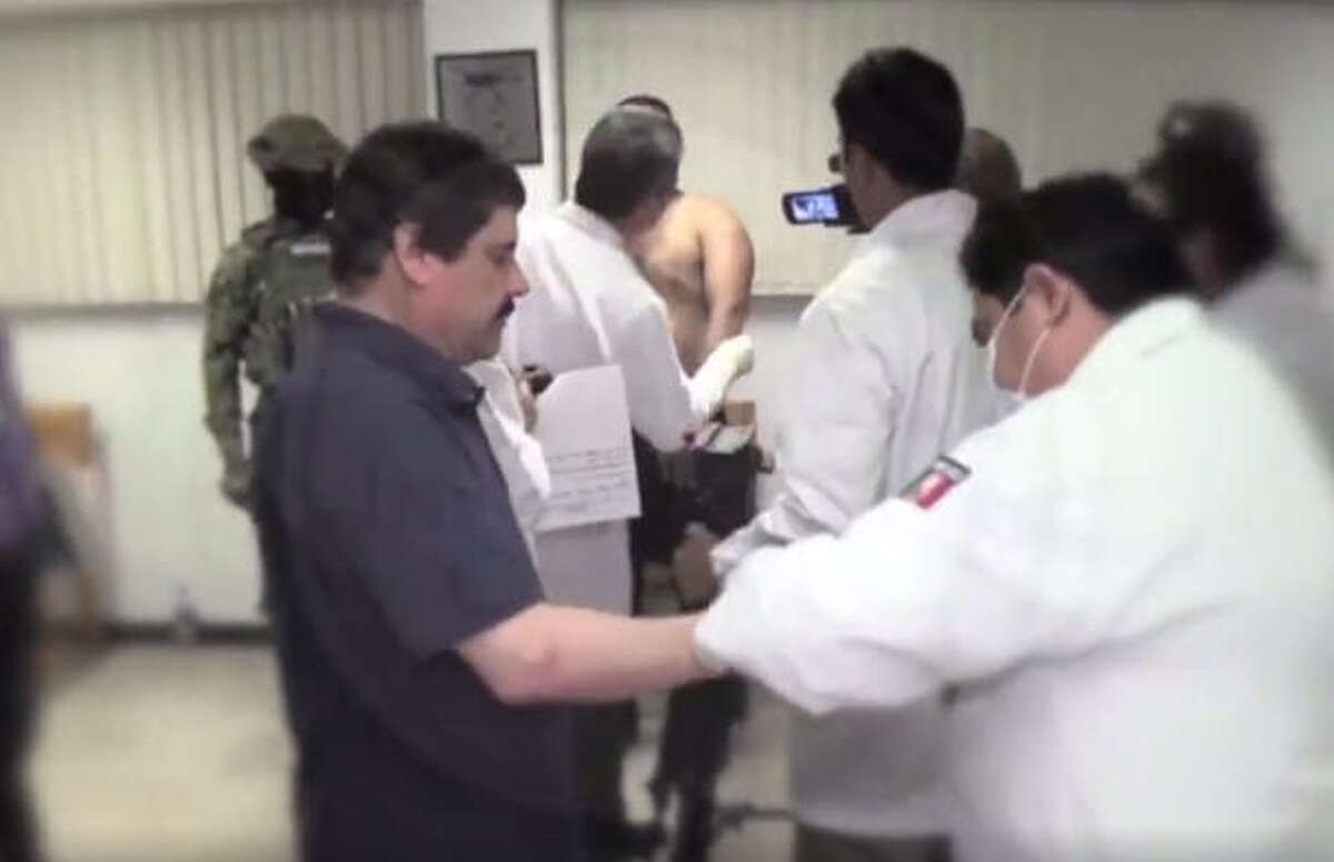 New images of Joaquin 'El Chapo' Guzman's capture don't show his best side