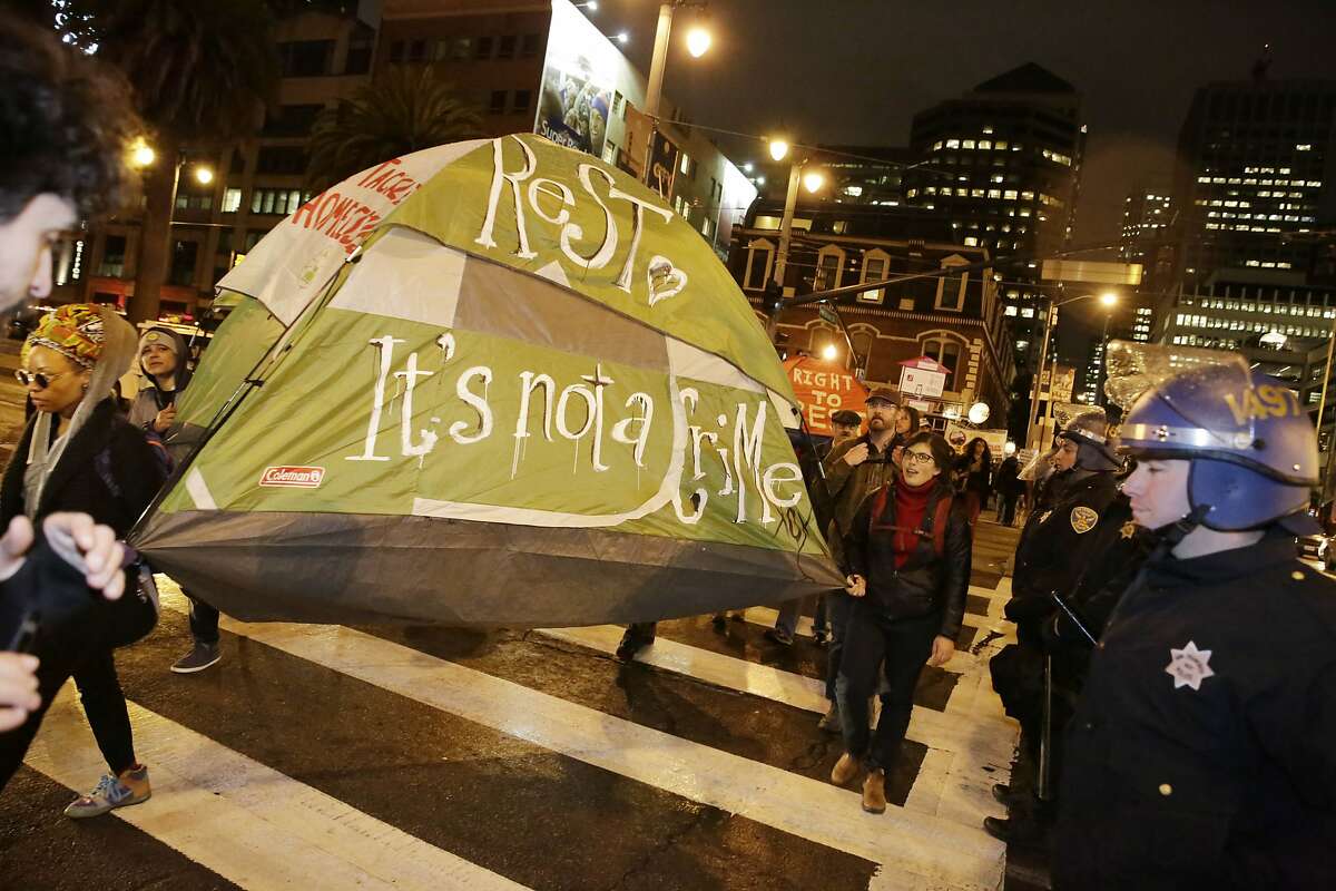 Homeless advocates face off with cops at Super Bowl City